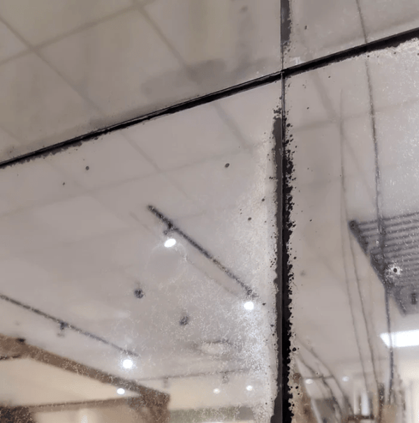 Mirror with nine sections of distressed glass – English Country Home