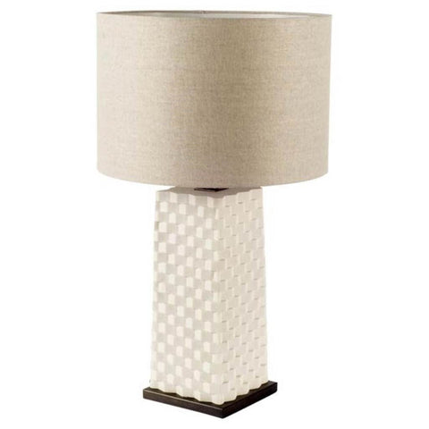 Table lamp featuring a ceramic base, alternating chequered pattern ...